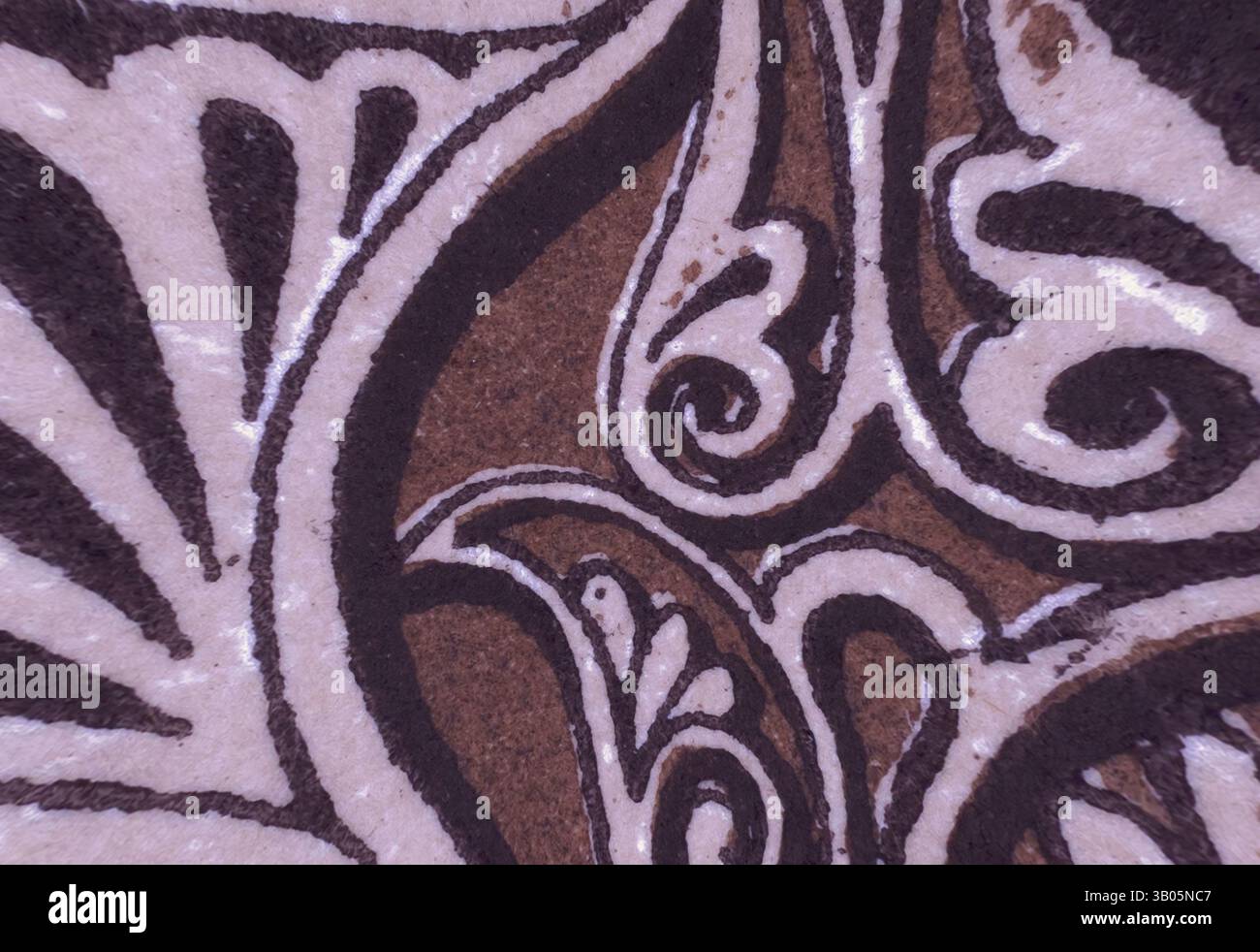 An intricate design features swirling patterns and bold curves ...