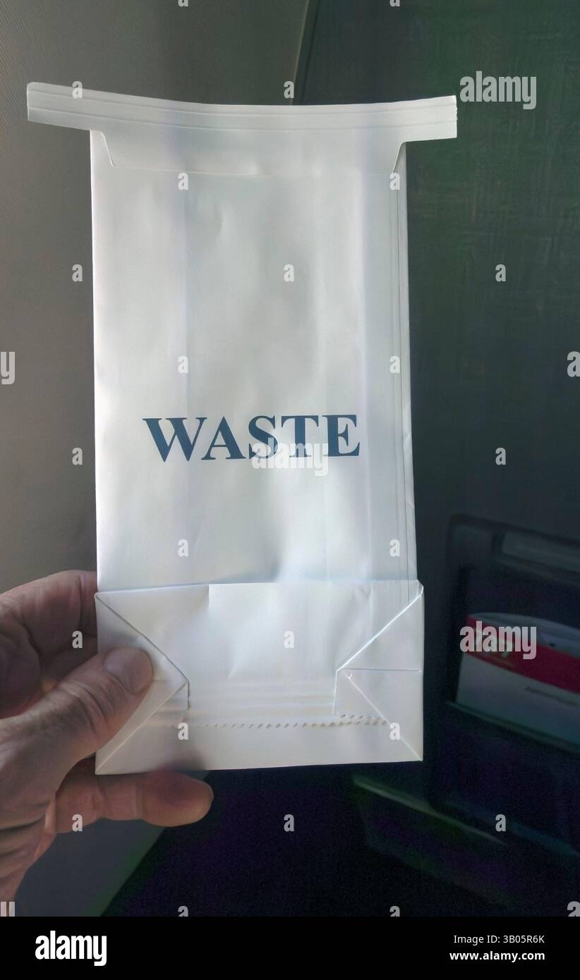 Airplane inflight waste bag Stock Photo - Alamy