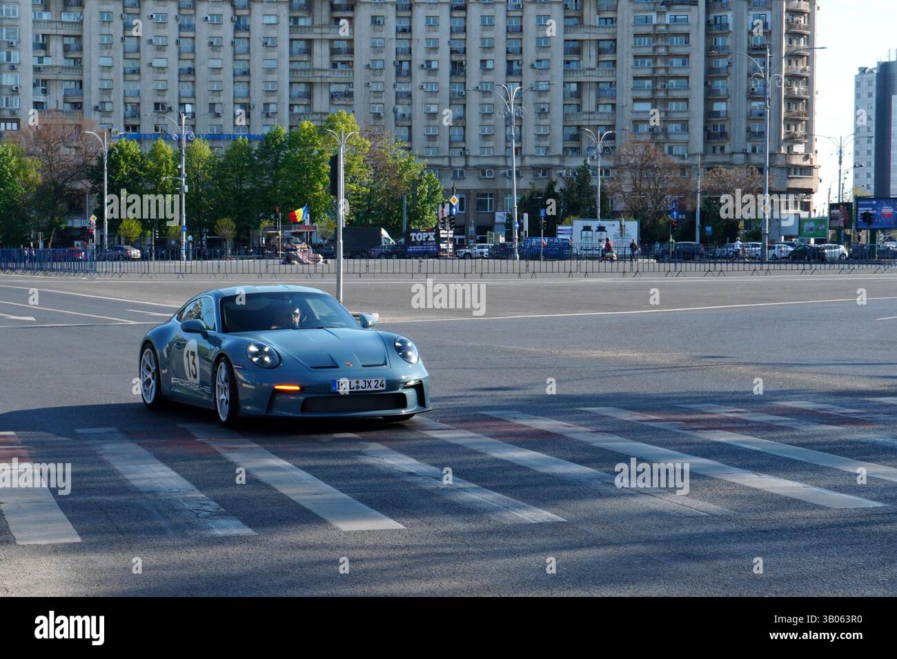 Bucharest, Romania – April 20, 2025: Front view of silver Porsche sport ...