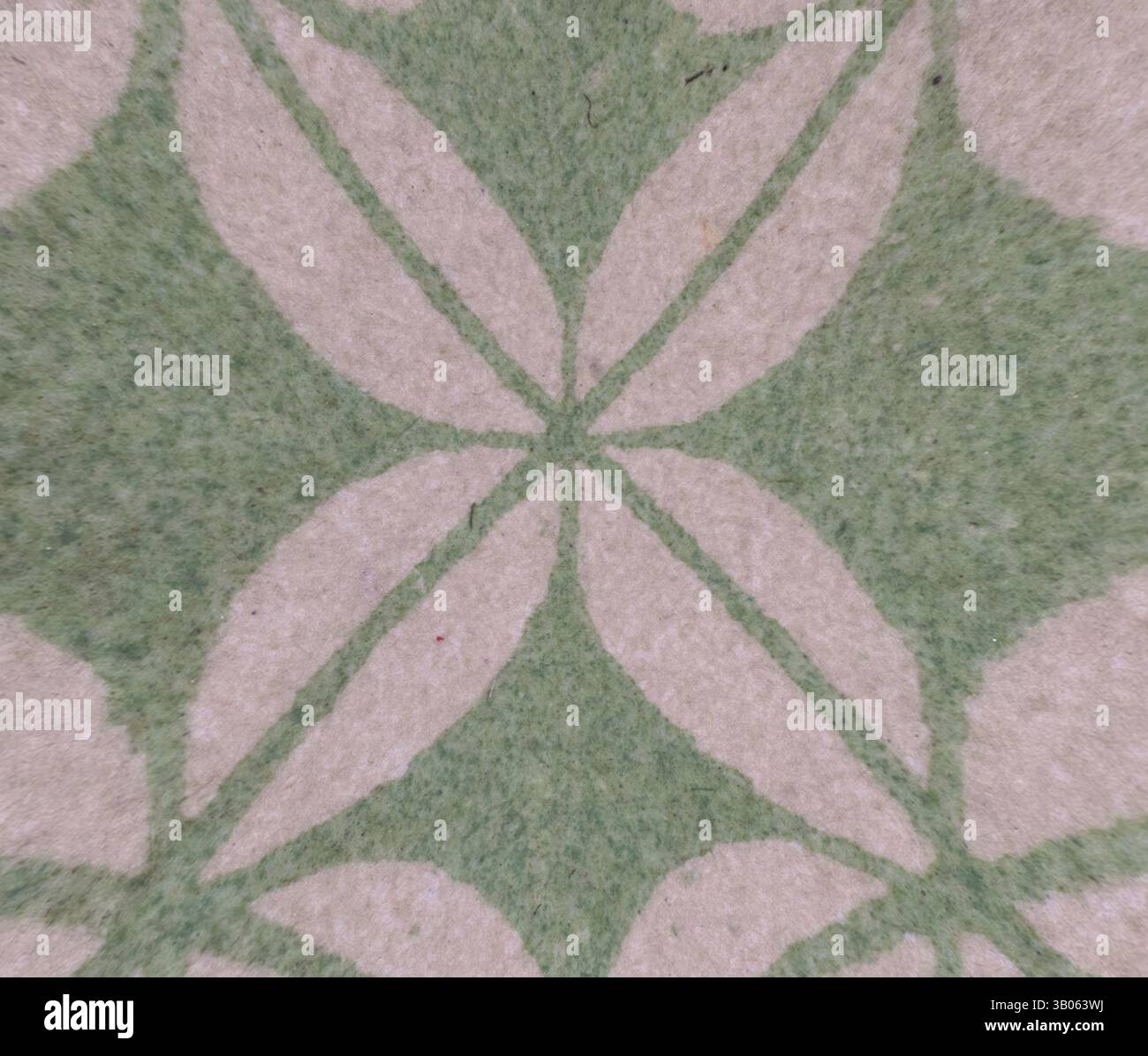 A close-up view of a textured surface featuring a repeating pattern of ...