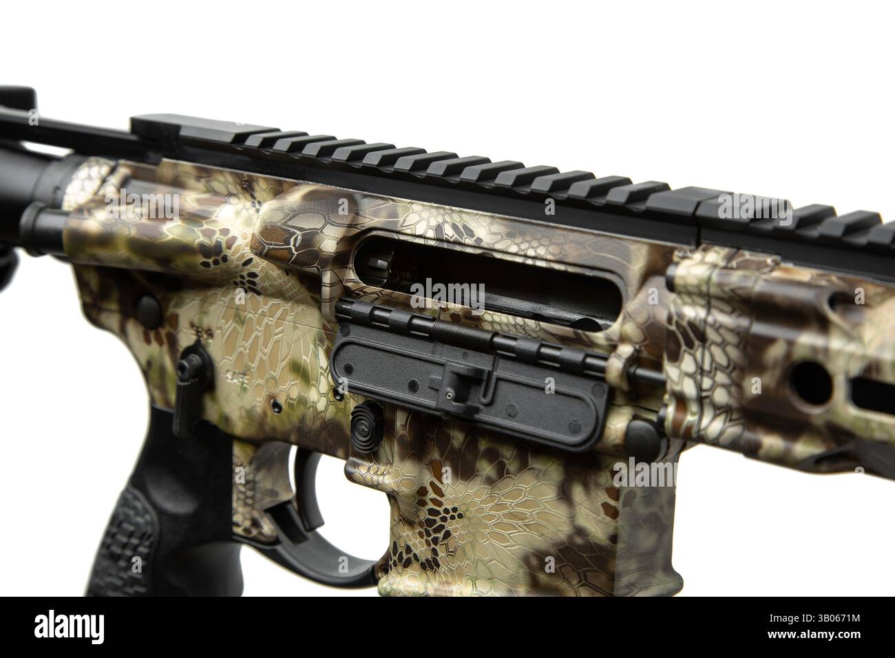 Detailed view of an AR-15 upper receiver with Kryptek camo finish and ...