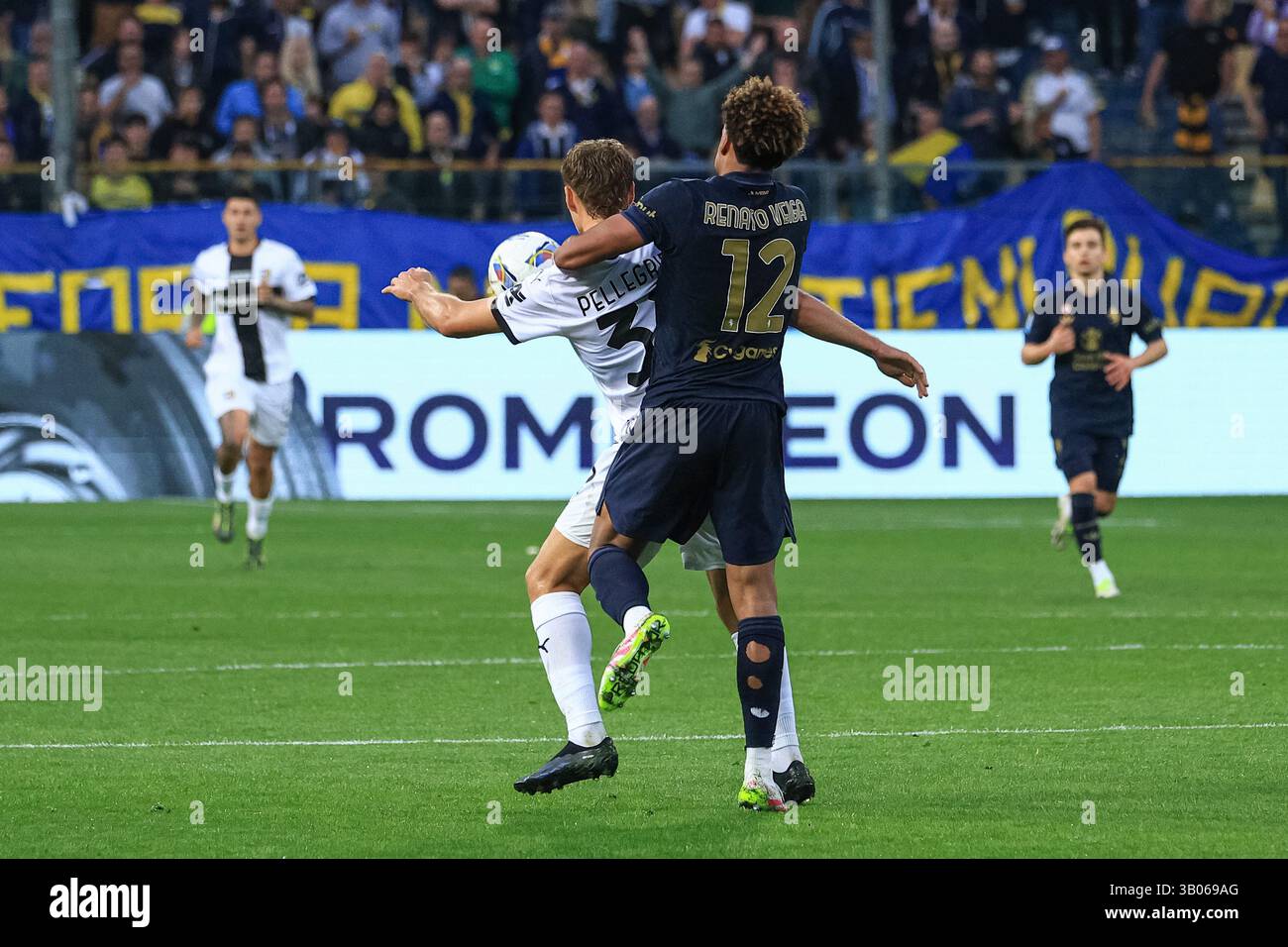 Parma, Italy. 23rd Apr, 2025. Renato Veiga (Juventus FC) fights for the ball against Mateo ...