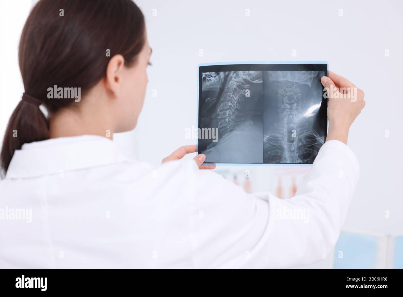 Doctor examining MRI scan in hospital, back view Stock Photo - Alamy