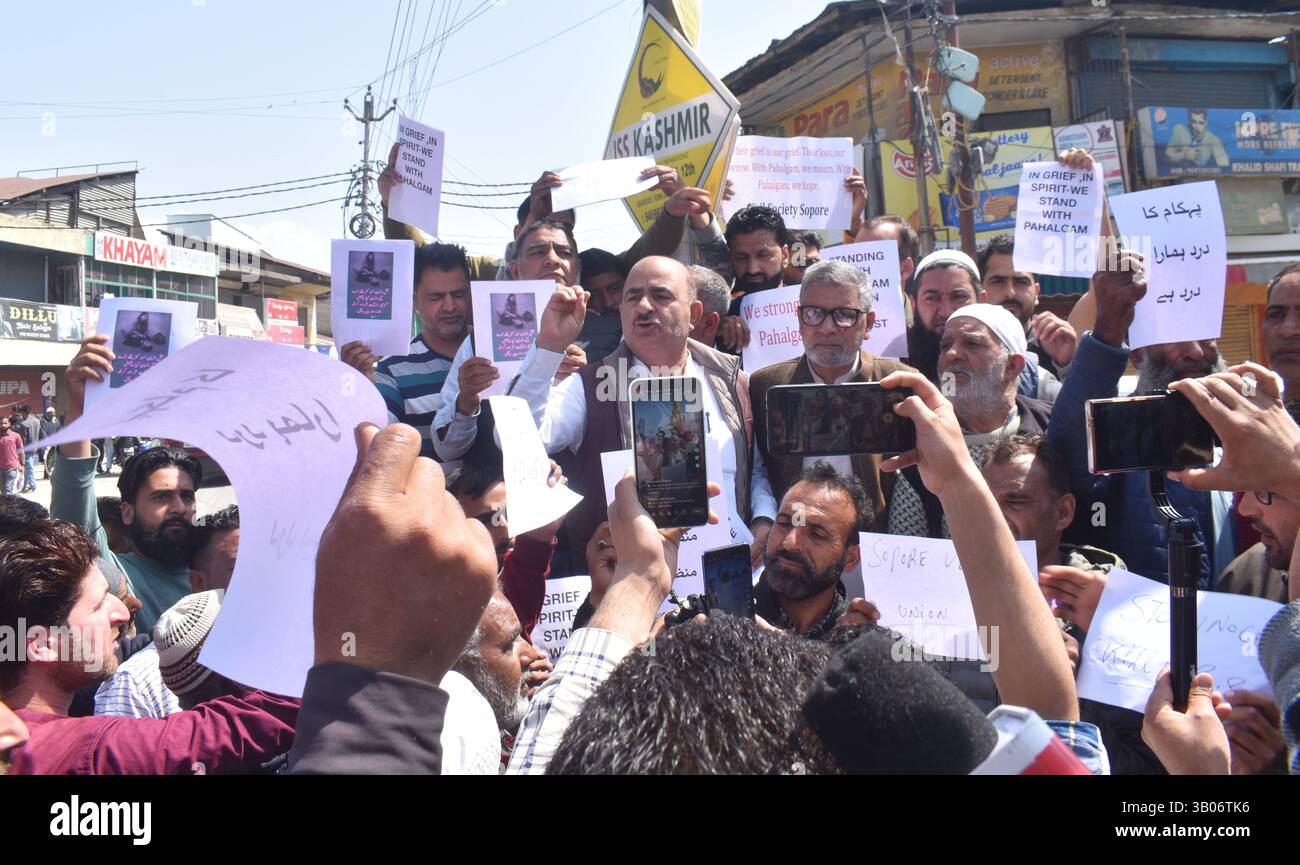 Sopore, India. 23rd Apr, 2025. People taking part during a protest ...