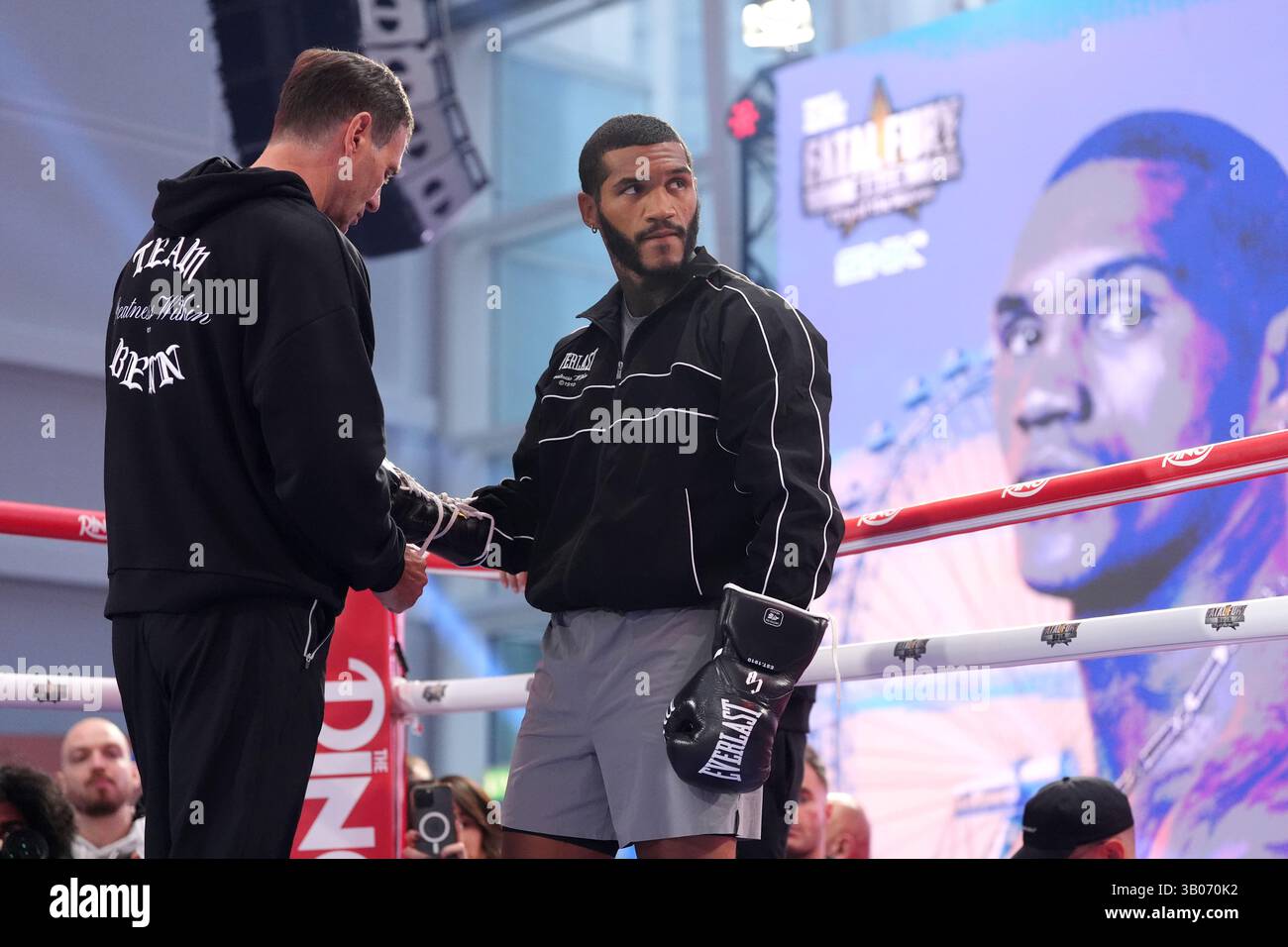 Conor Benn (right) with trainer Tony Sims during a public workout at ...