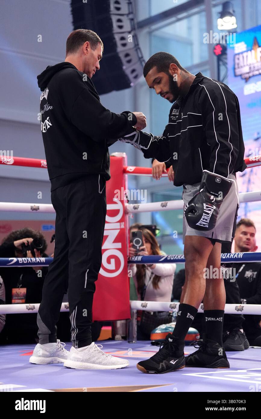 Conor Benn (right) with trainer Tony Sims during a public workout at ...
