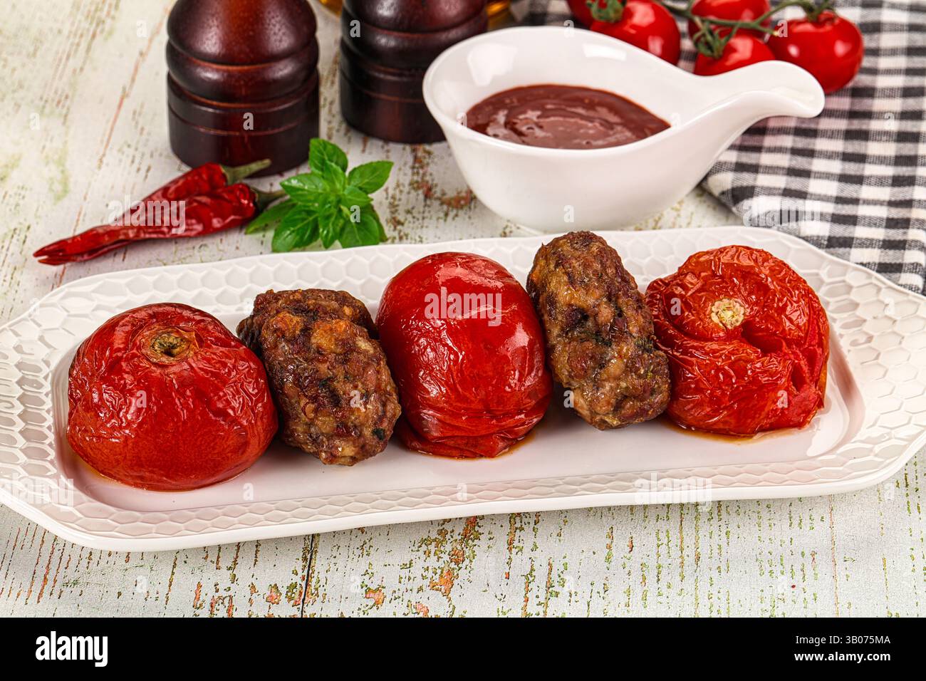 Turkish cuisine - Domatesli Kebab with minced meat and tomato Stock ...