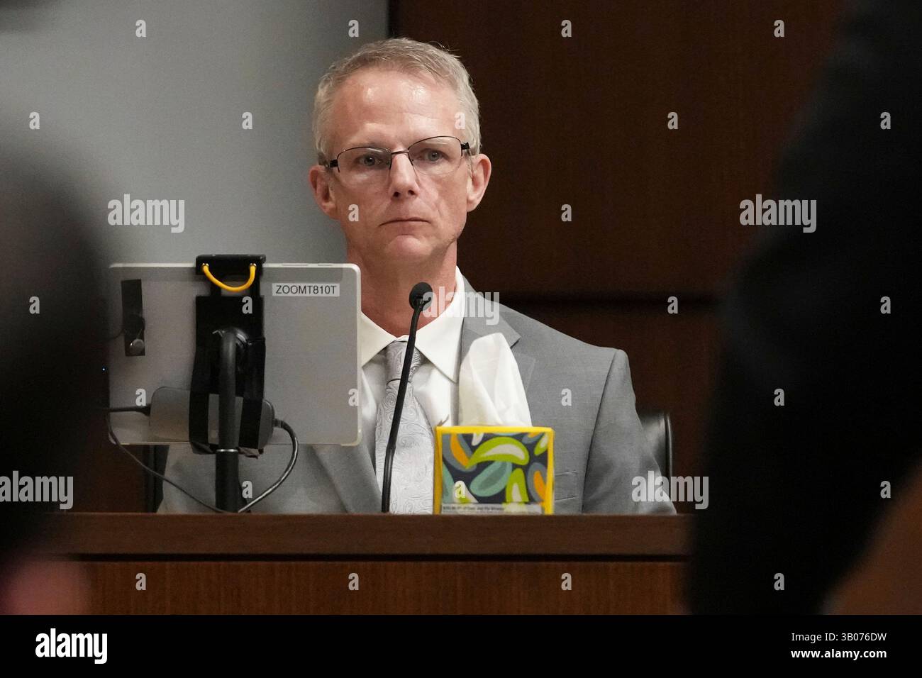 Brian Bodden, detective from City of Highland Park, answers a question ...