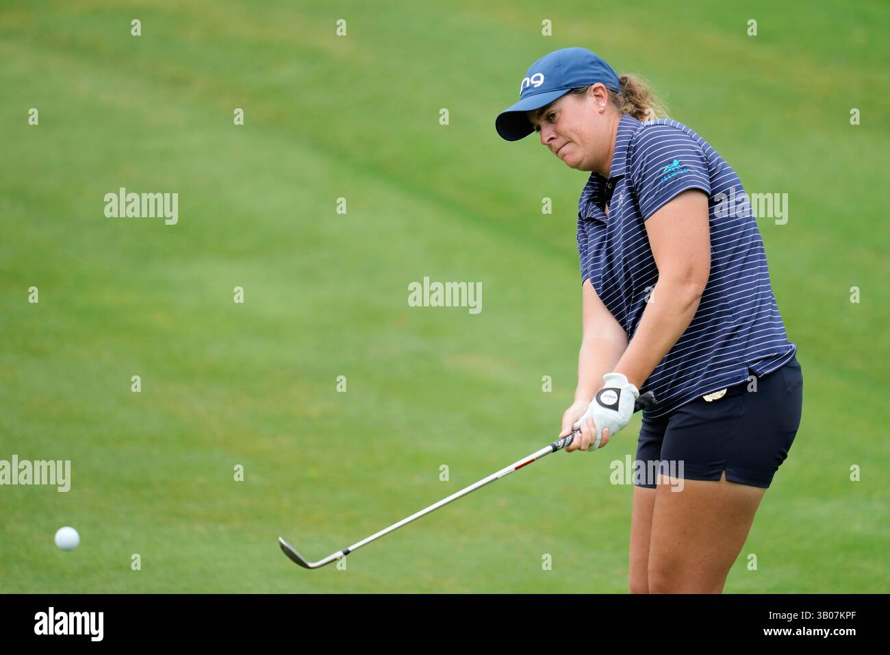 Lauren Coughlin chips onto the second green during a practice round at ...