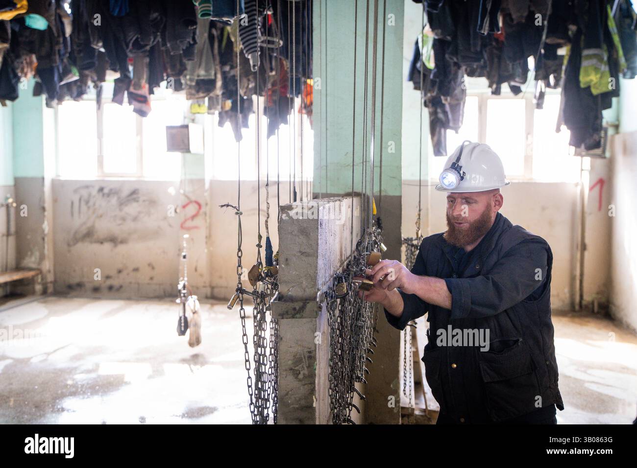 Miners work at Trepca mining complex, in Kosovo A miner prepares for ...