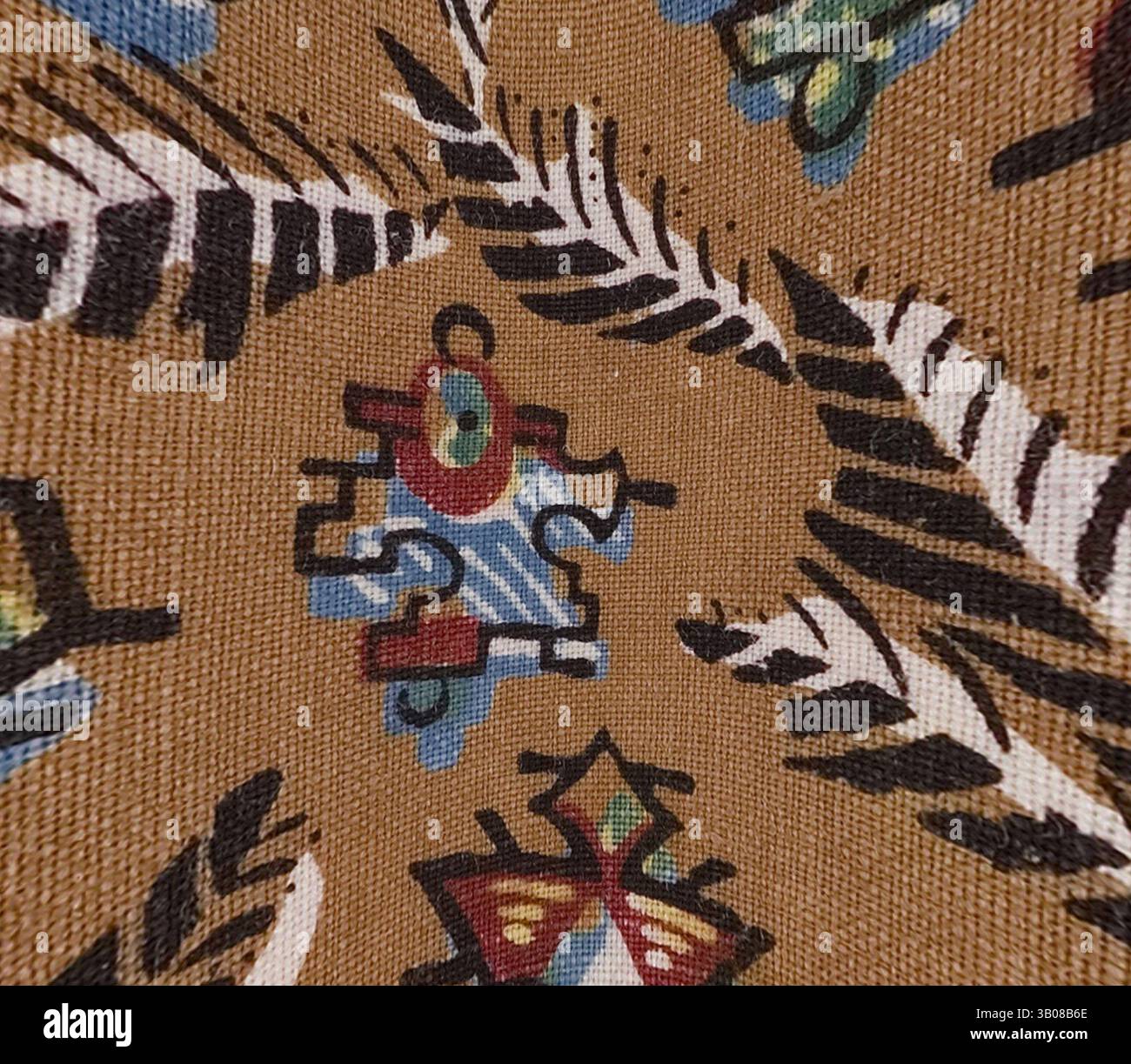 A textured fabric featuring a vibrant design of geometric shapes and ...