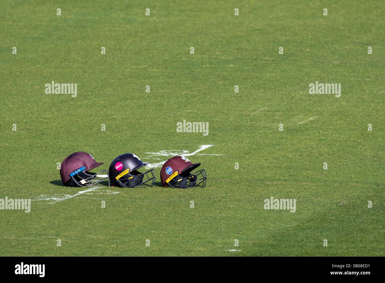 Three cricket helmets hi-res stock photography and images - Alamy