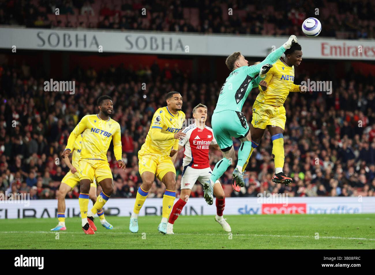 Crystal Palace's goalkeeper Dean Henderson, 2nd right, goes for the ...