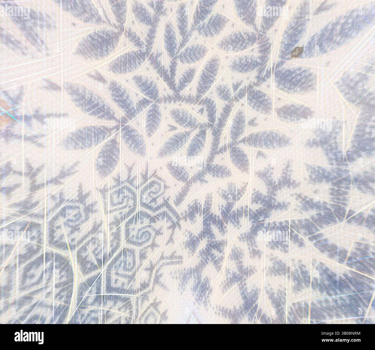 A complex, intricate pattern featuring intertwining leaves and ...