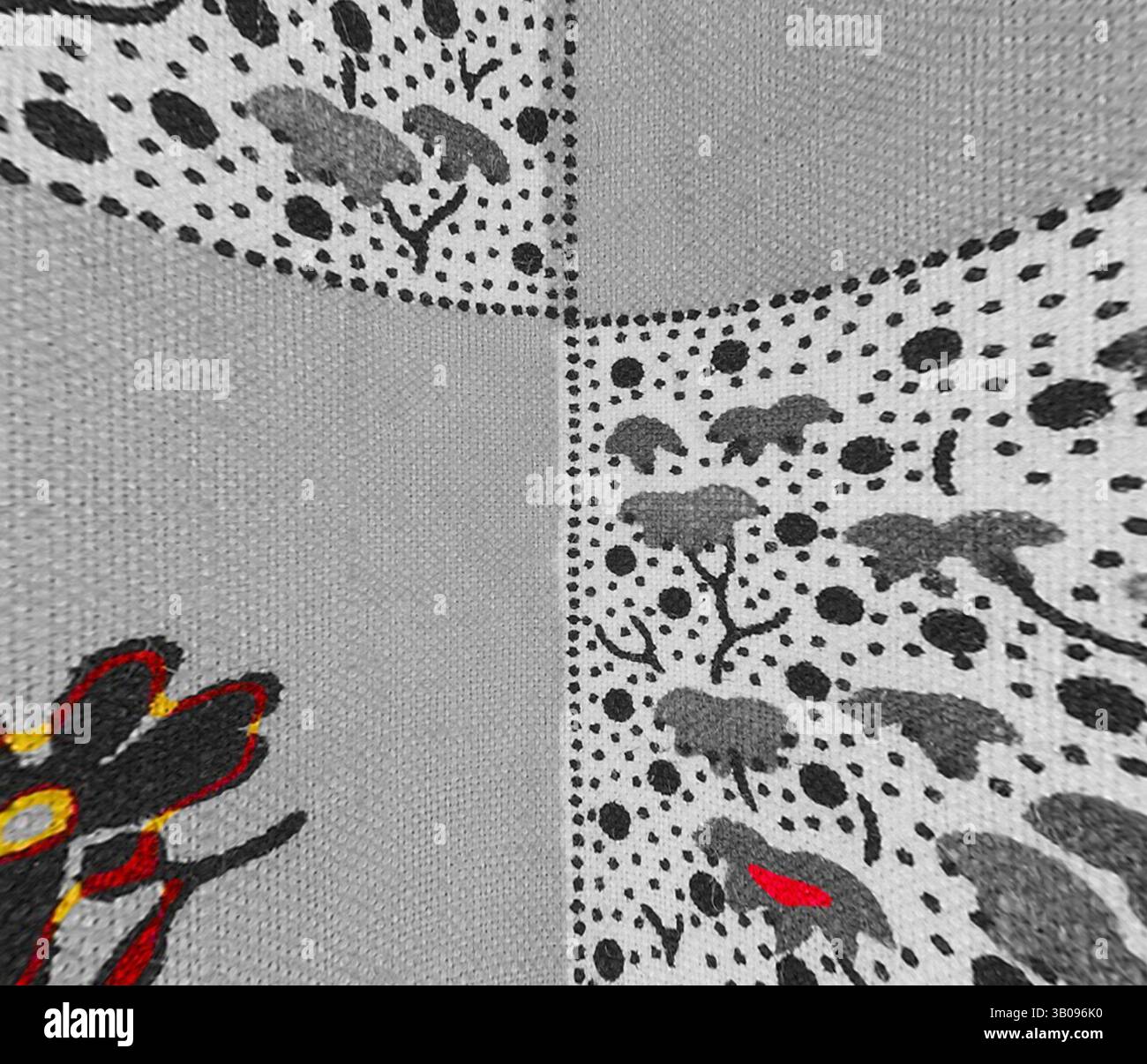 A textured surface divided into quadrants, featuring intricate patterns ...