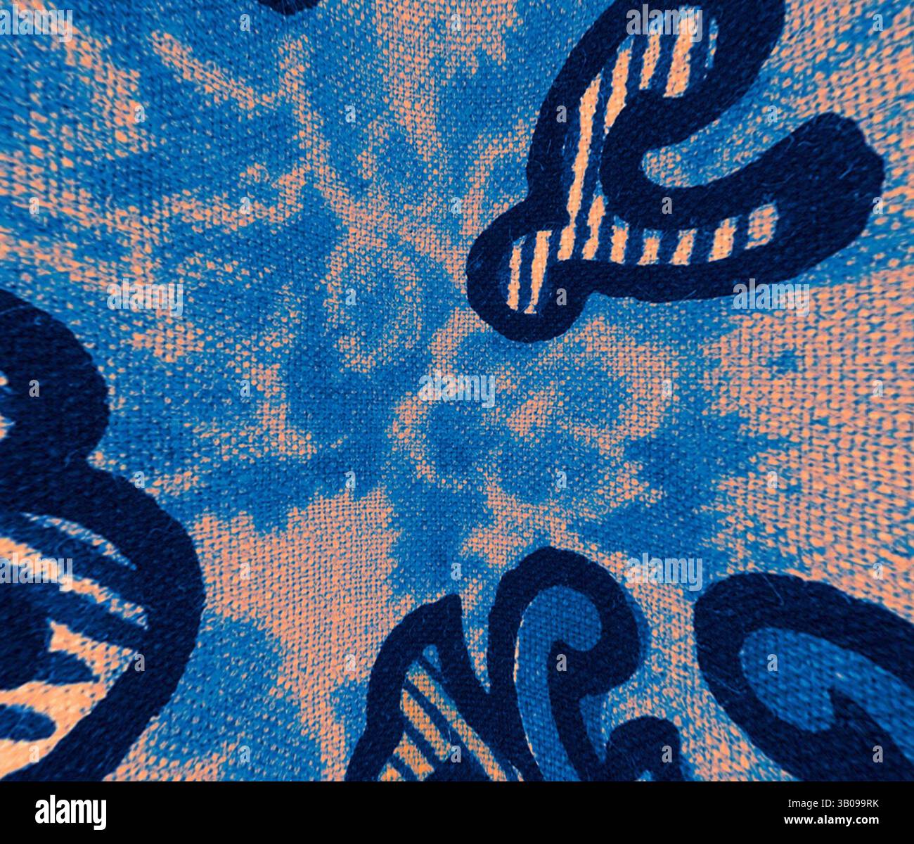A vibrant textile featuring intricate patterns and bold shapes in ...