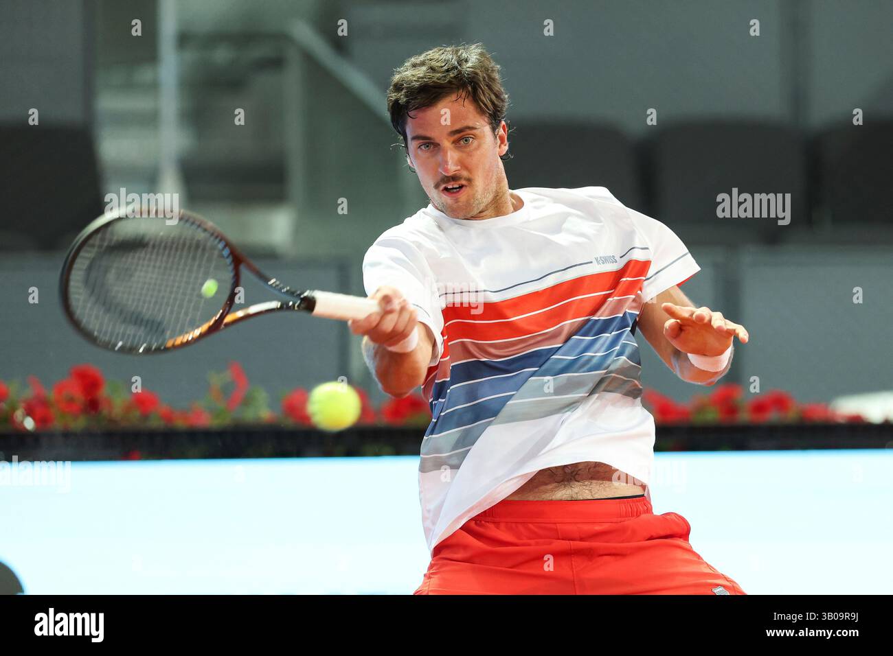 Borna Gojo of Croatia in action against Gael Monfils of France during ...
