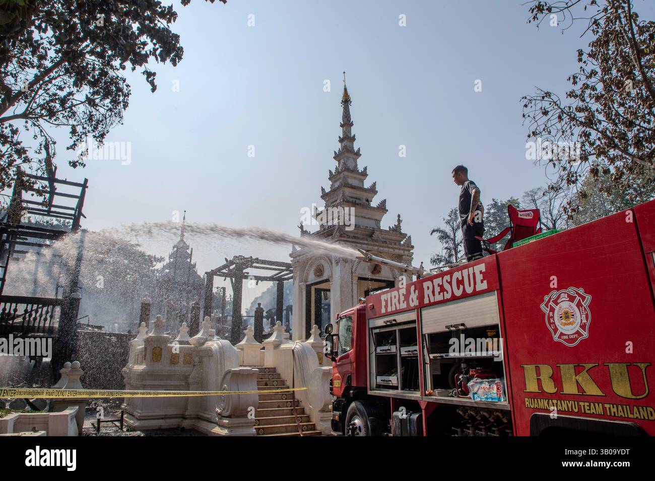 Chiang Mai, Thailand. 23rd Apr, 2025. A firefighter is seen battling ...