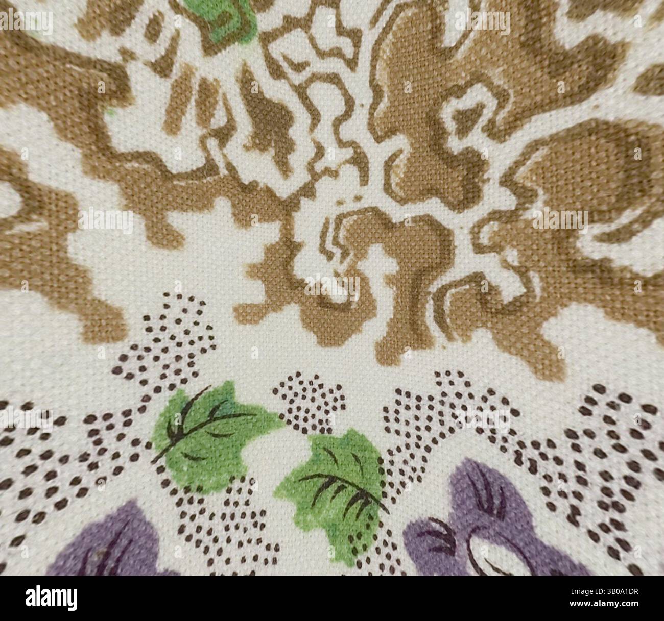 An intricate fabric design featuring organic shapes and floral patterns ...