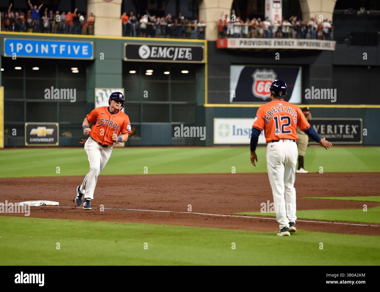 Houston Astros center fielder Jake Meyers (6) rounds third, scoring on ...