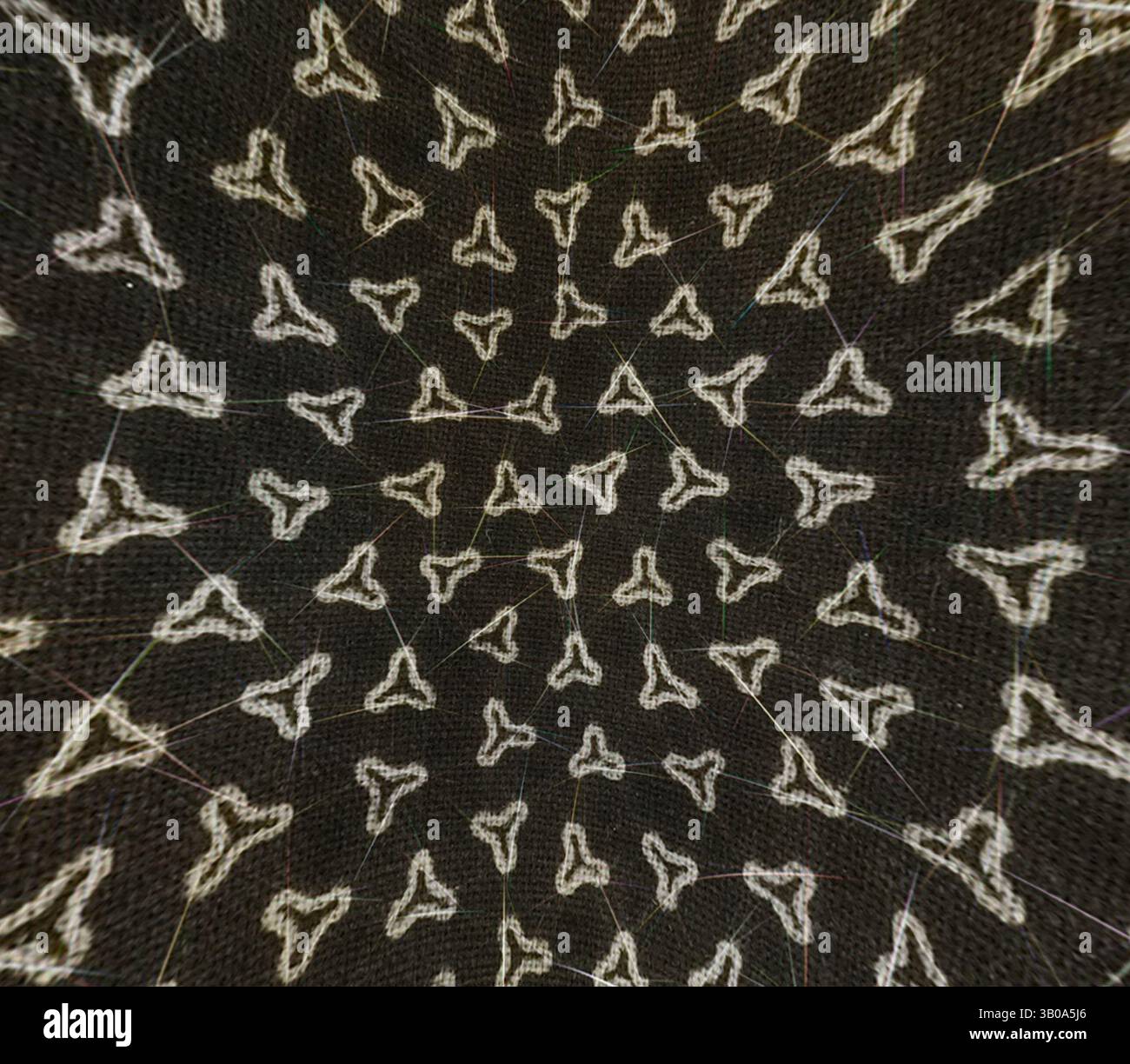 A captivating pattern features a repetitive design of triangular shapes ...