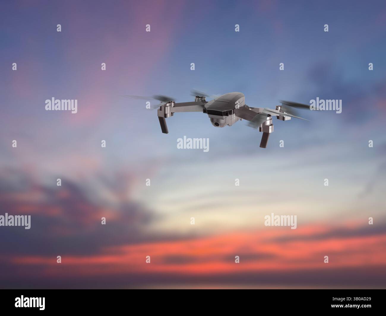 Drone with camera flying in sky. Unmanned aerial vehicle for ...