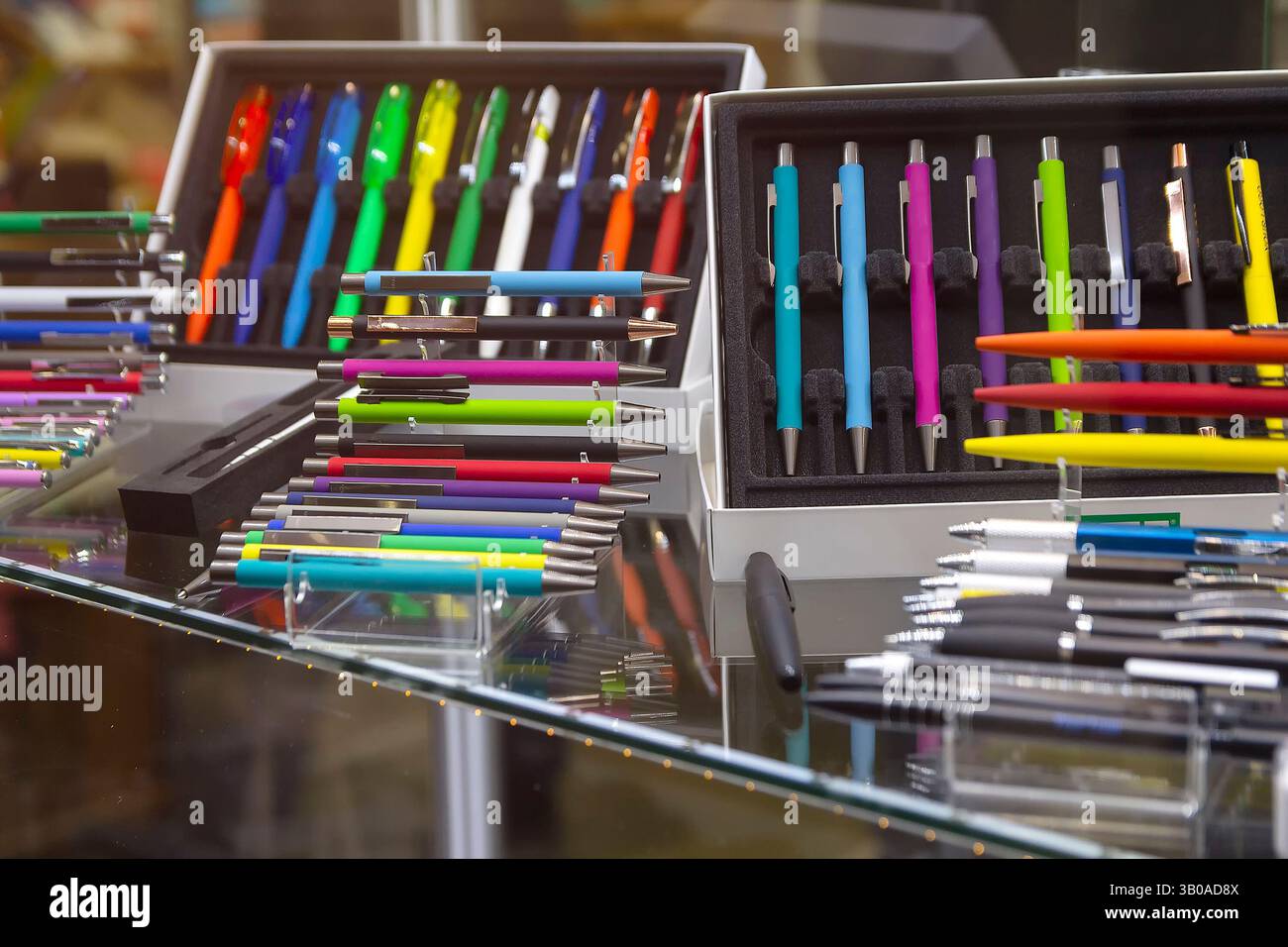 Modern colored plastic ballpoint pens on store display. Sale Stock ...