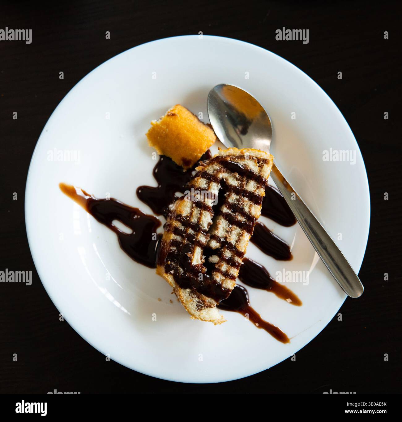 Spanish sweet dessert Brazo de Gitano with filling of nutella Stock ...