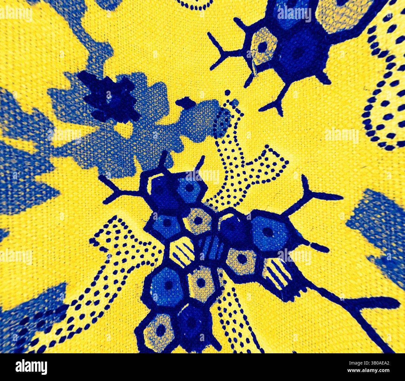 An intricate pattern of blue and yellow shapes, featuring floral motifs ...