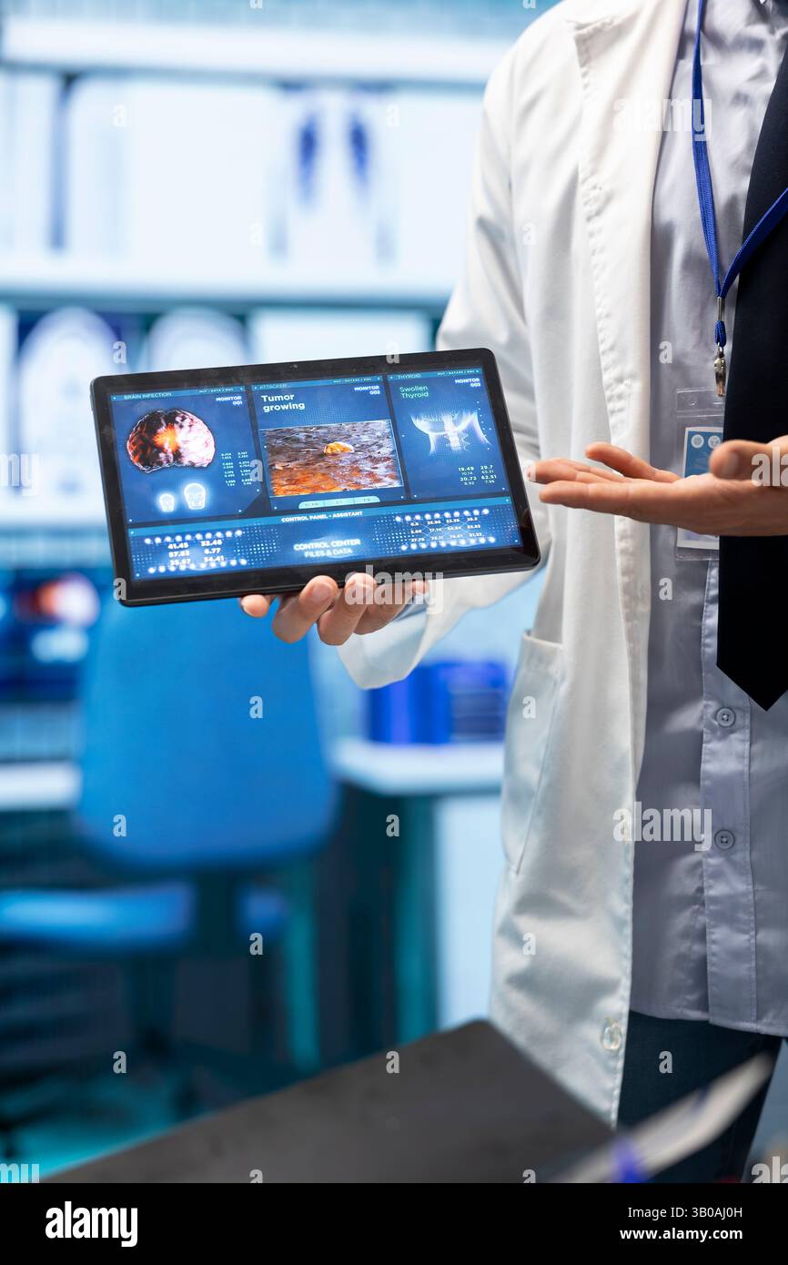 In a treatment center, healthcare professionals review mri scan test ...