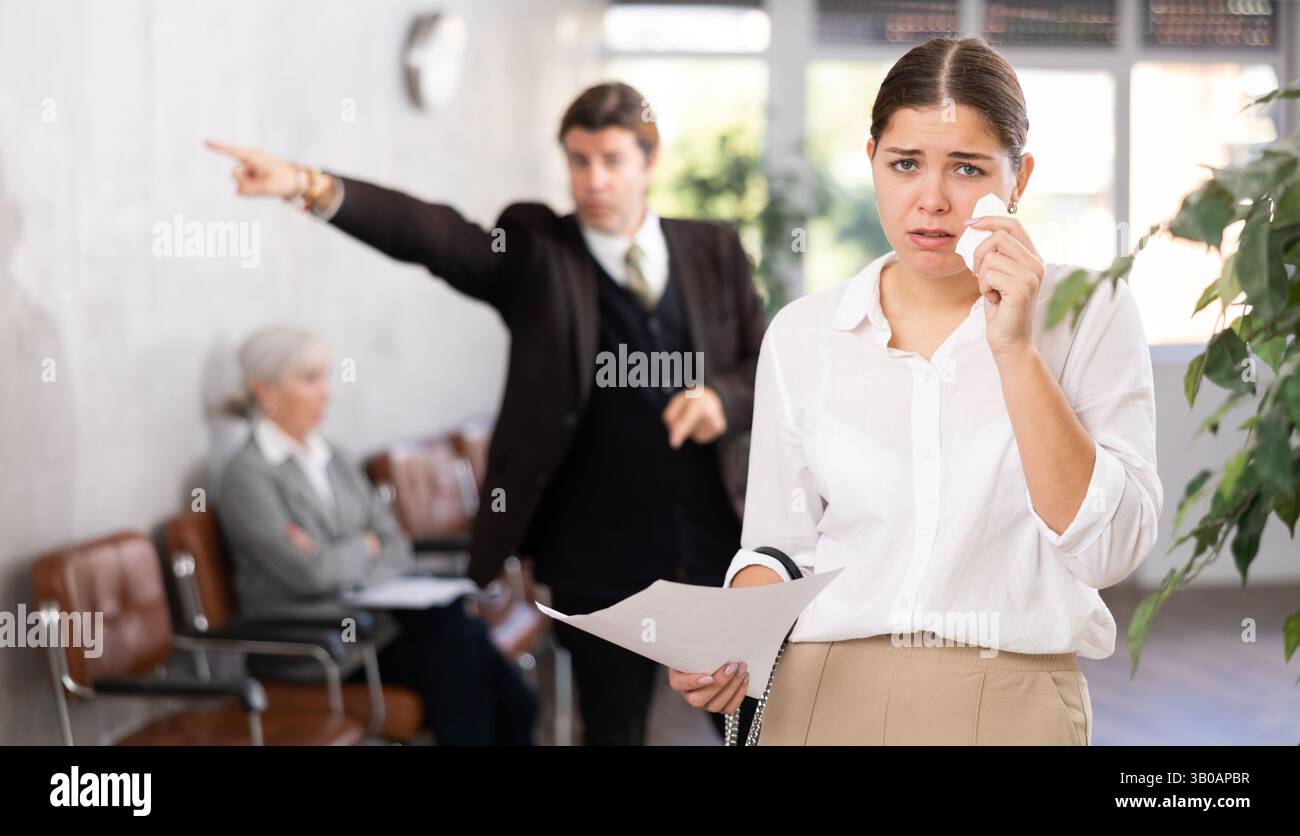 Boss scolding young inexperienced employee hi-res stock photography and ...