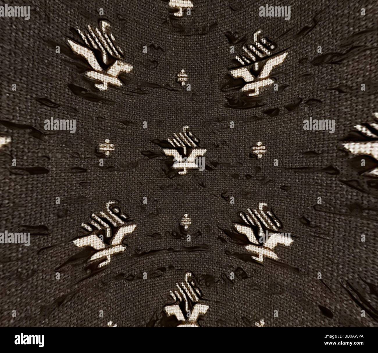 A textured surface featuring a repeating pattern of stylized emblems ...