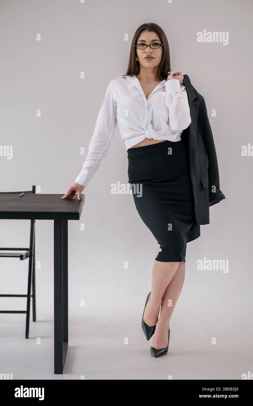 Woman tied to table hi-res stock photography and images - Alamy