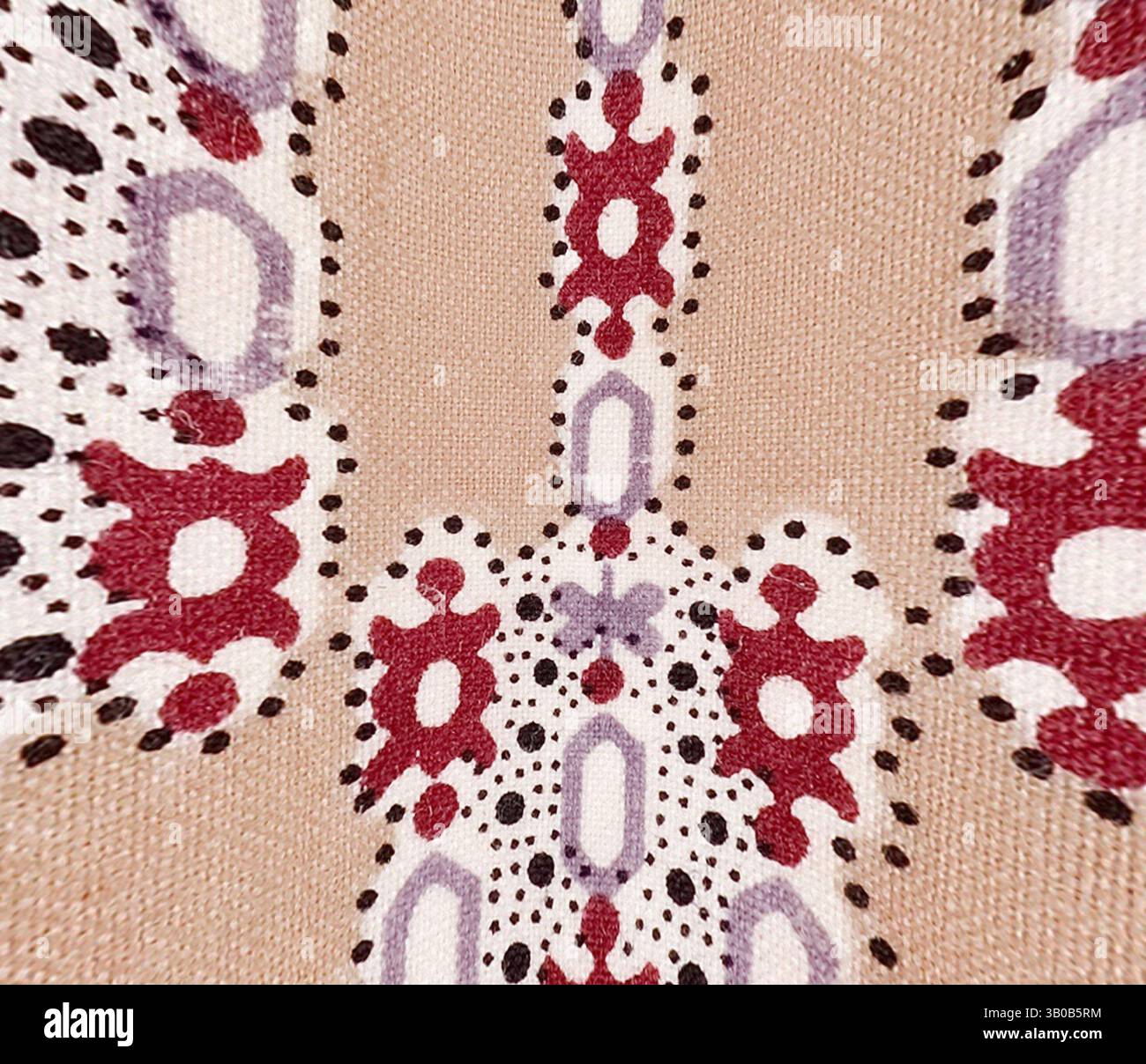 A textured fabric featuring an intricate pattern of geometric shapes in ...