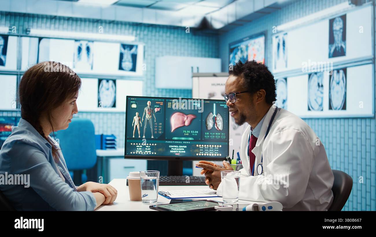 African american medic doing a scan interpretation with female patient ...