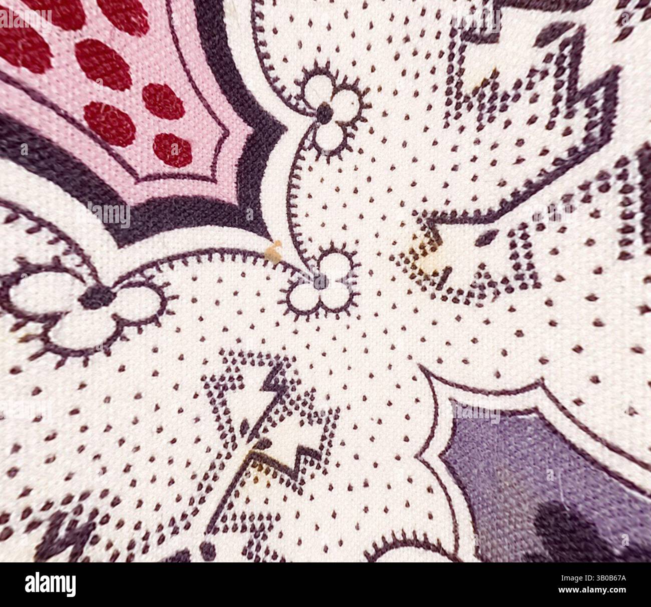 An intricate pattern featuring floral designs and geometric shapes ...