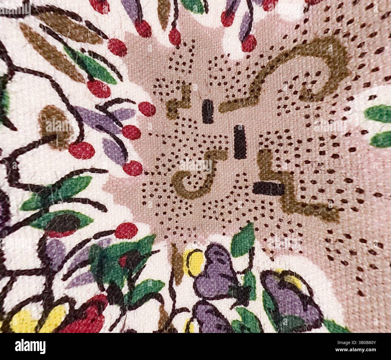 An intricate design featuring floral motifs, dotted patterns, and ...
