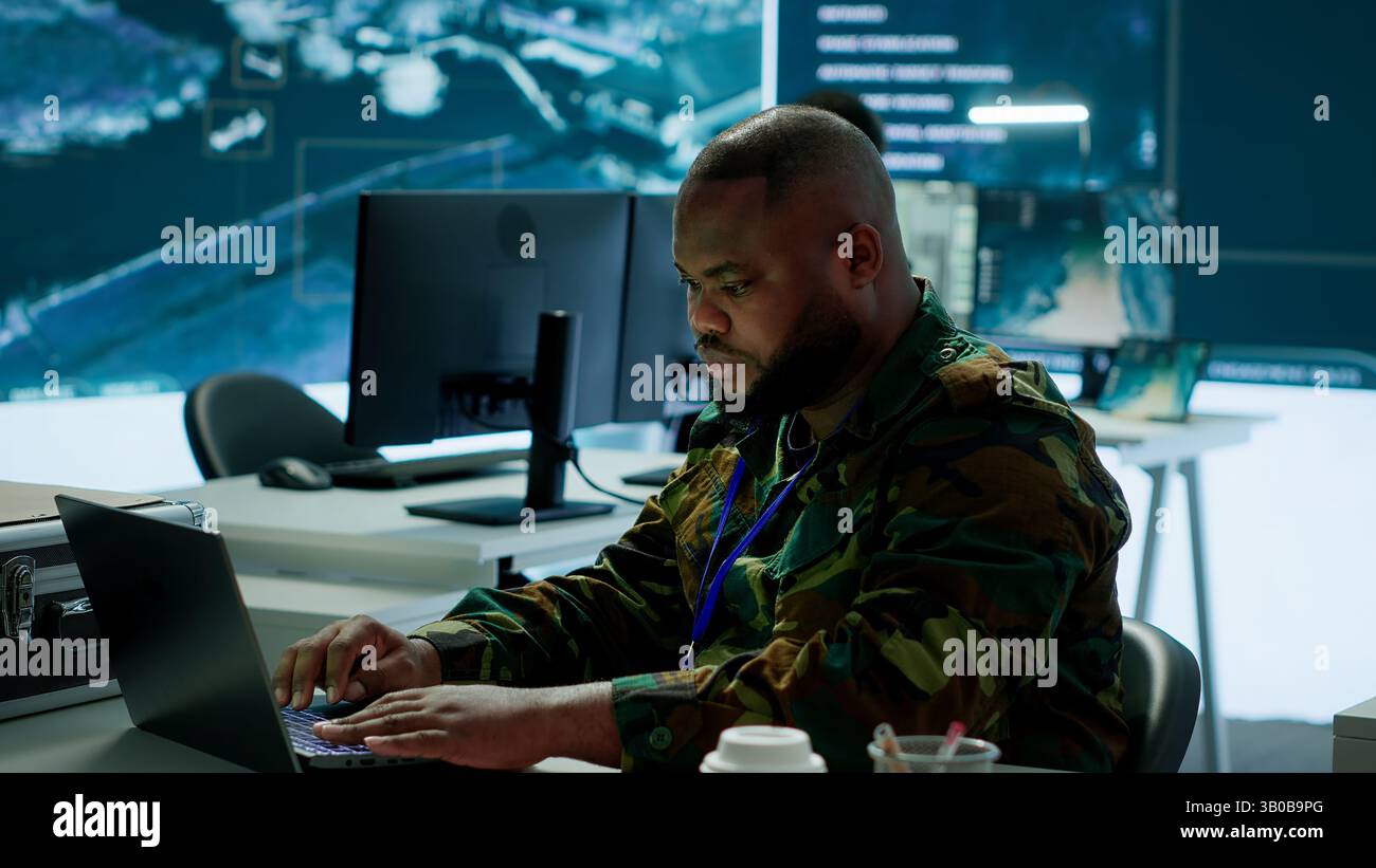 Team Of Military Professionals In Control Center Monitors Satellite Intelligence Collecting