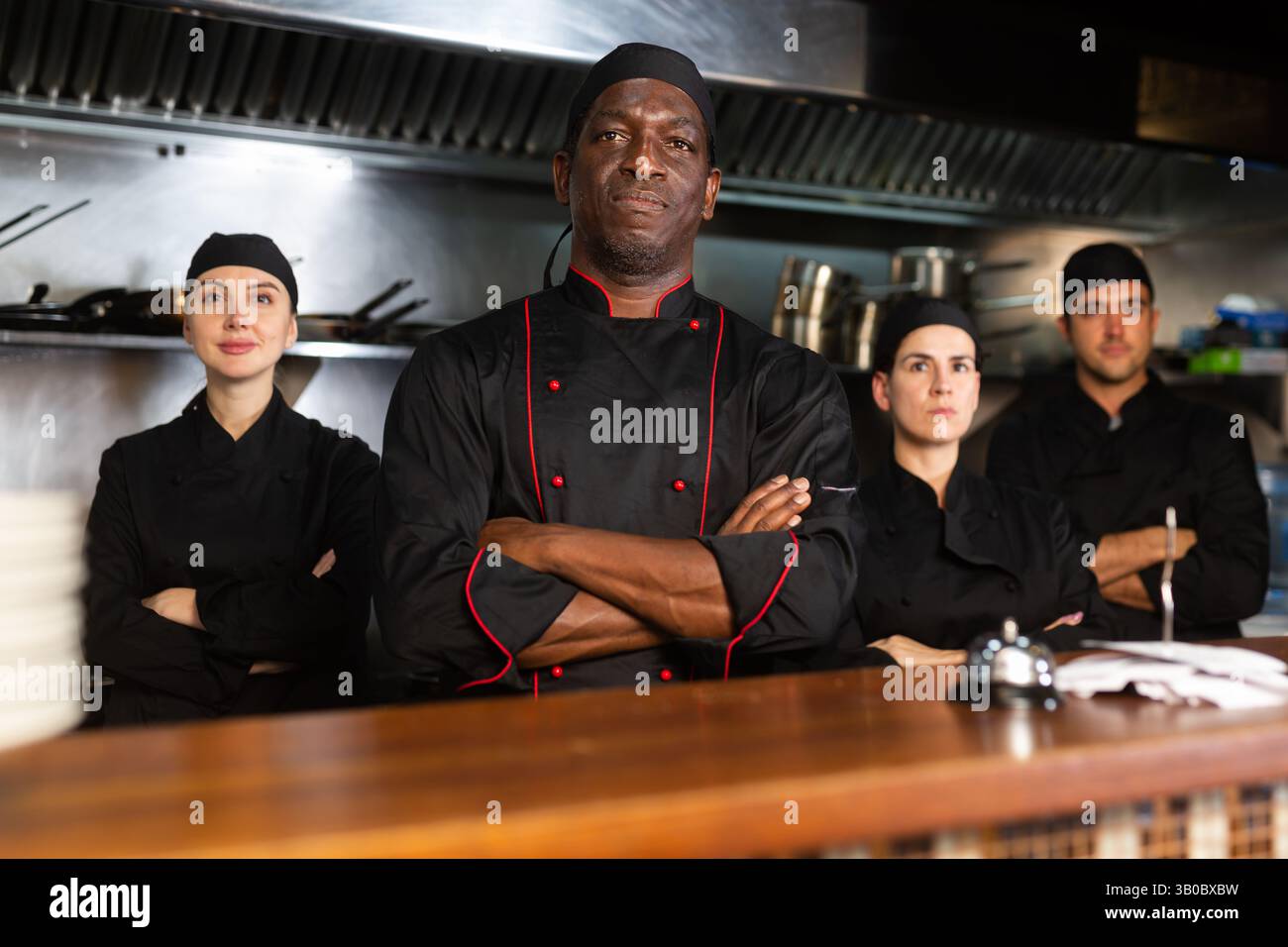 Head chef with team hi-res stock photography and images - Alamy