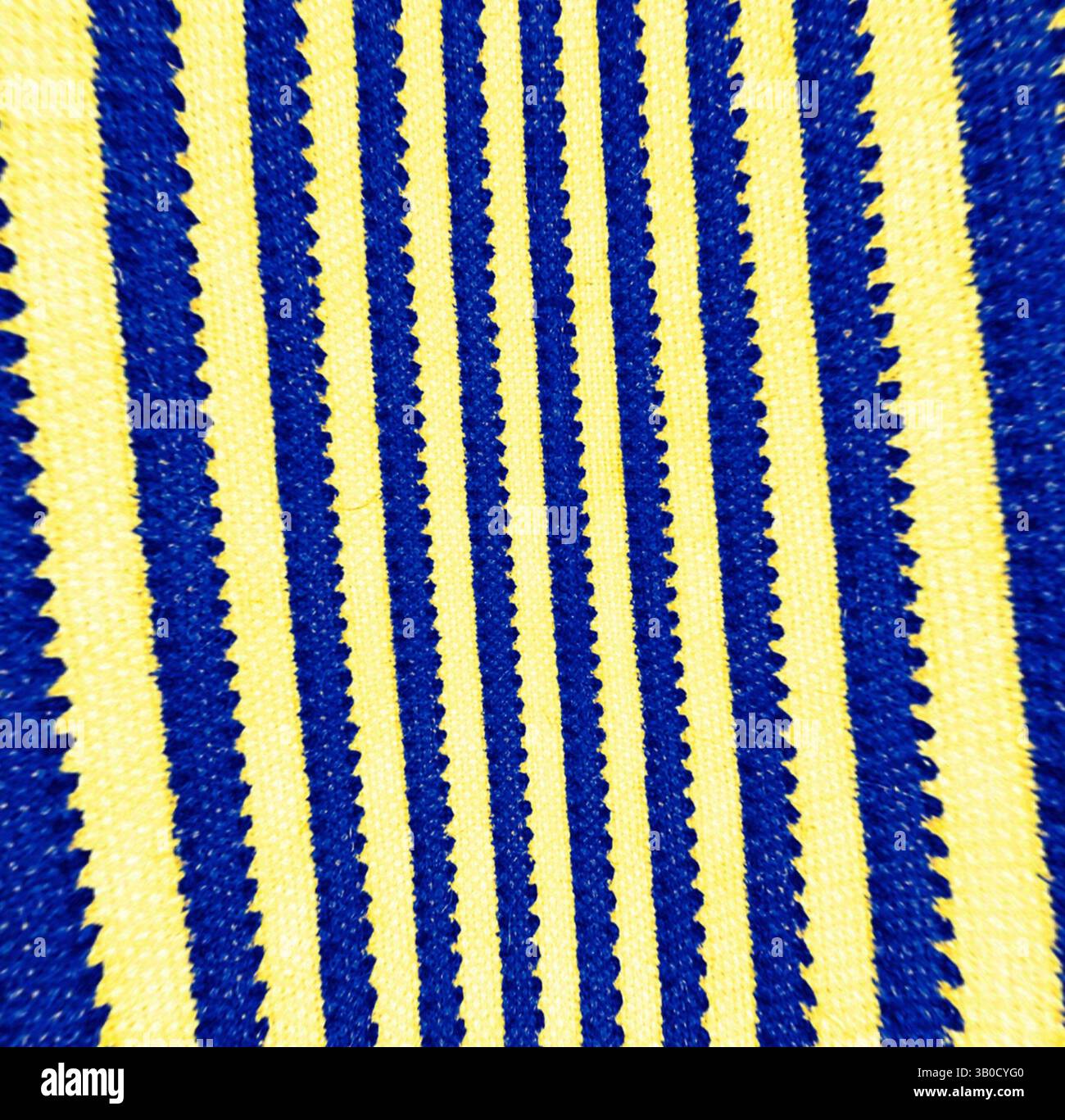 A vibrant textile featuring bold, zigzag-patterned stripes in ...