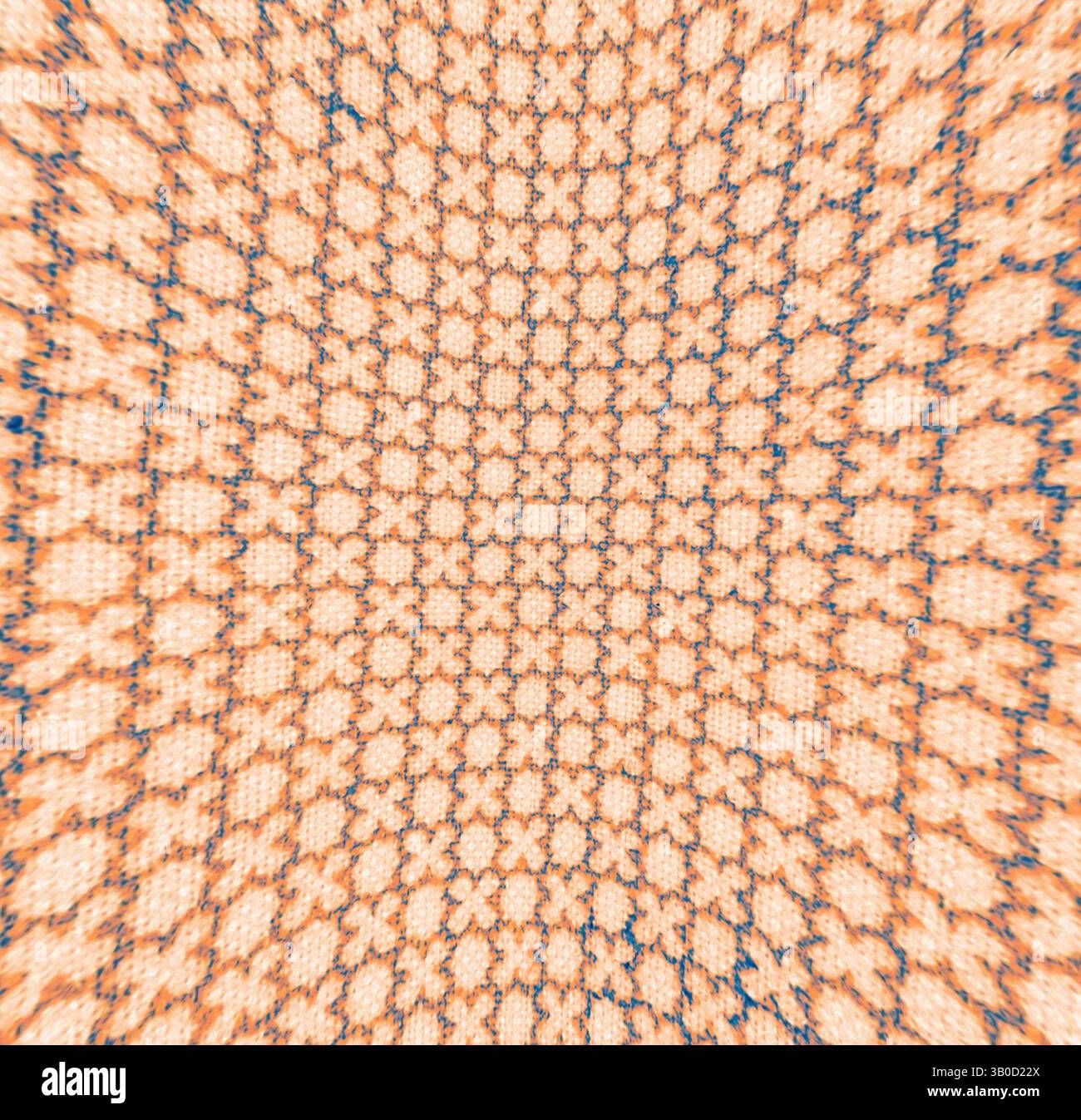 A close-up view of a textured fabric featuring an intricate pattern of ...