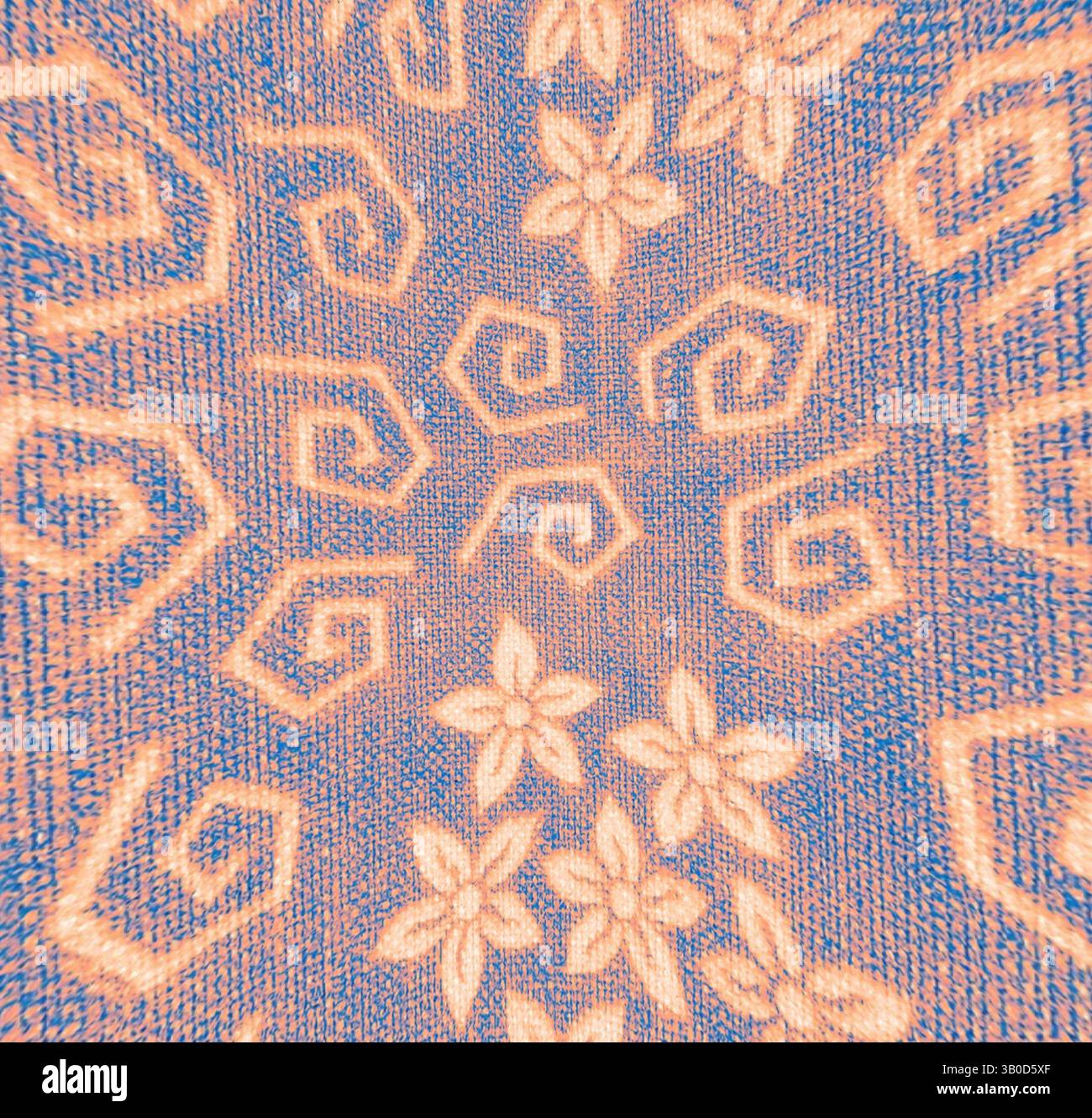 A swirling pattern of intricate spirals and delicate flowers creates a ...
