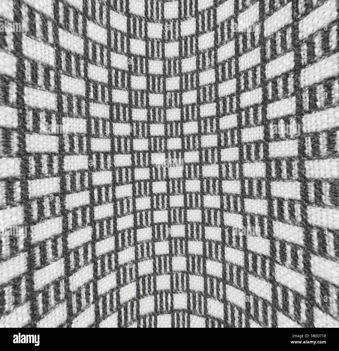 A close-up view of a textured pattern featuring a checkerboard design ...