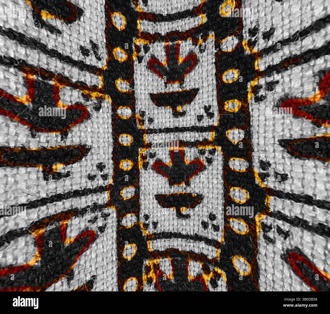 A close-up view of intricate textile art featuring bold patterns in ...