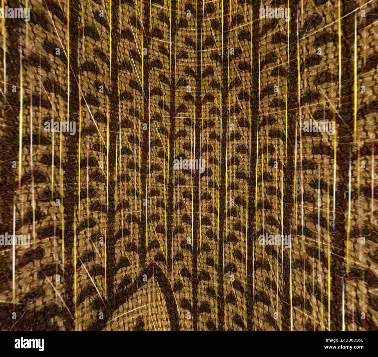 A close-up view of intricately woven fabric, showcasing a repeating ...
