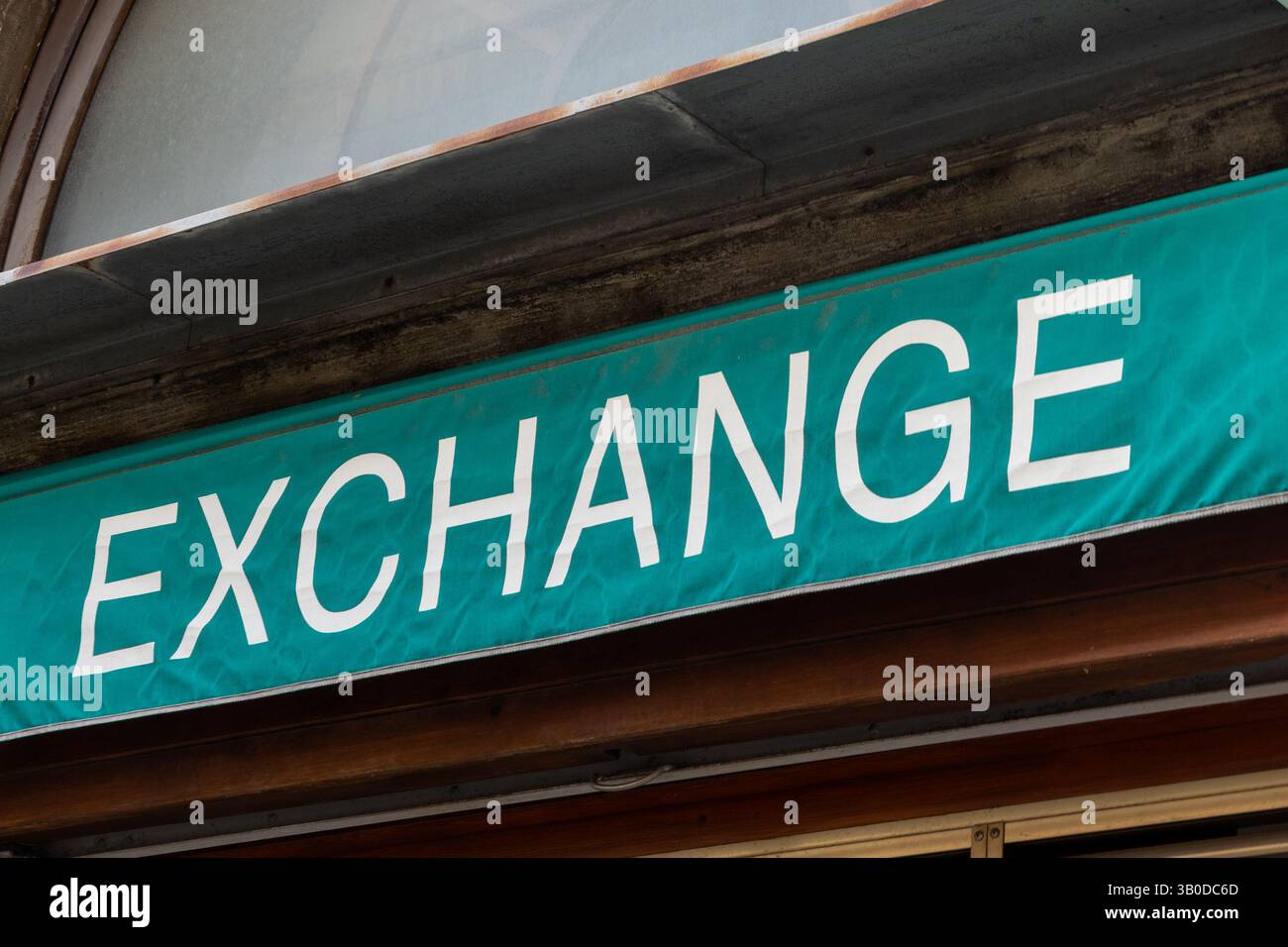 Venice, Italy - April 20 2025: Currency exchange sign above public ...