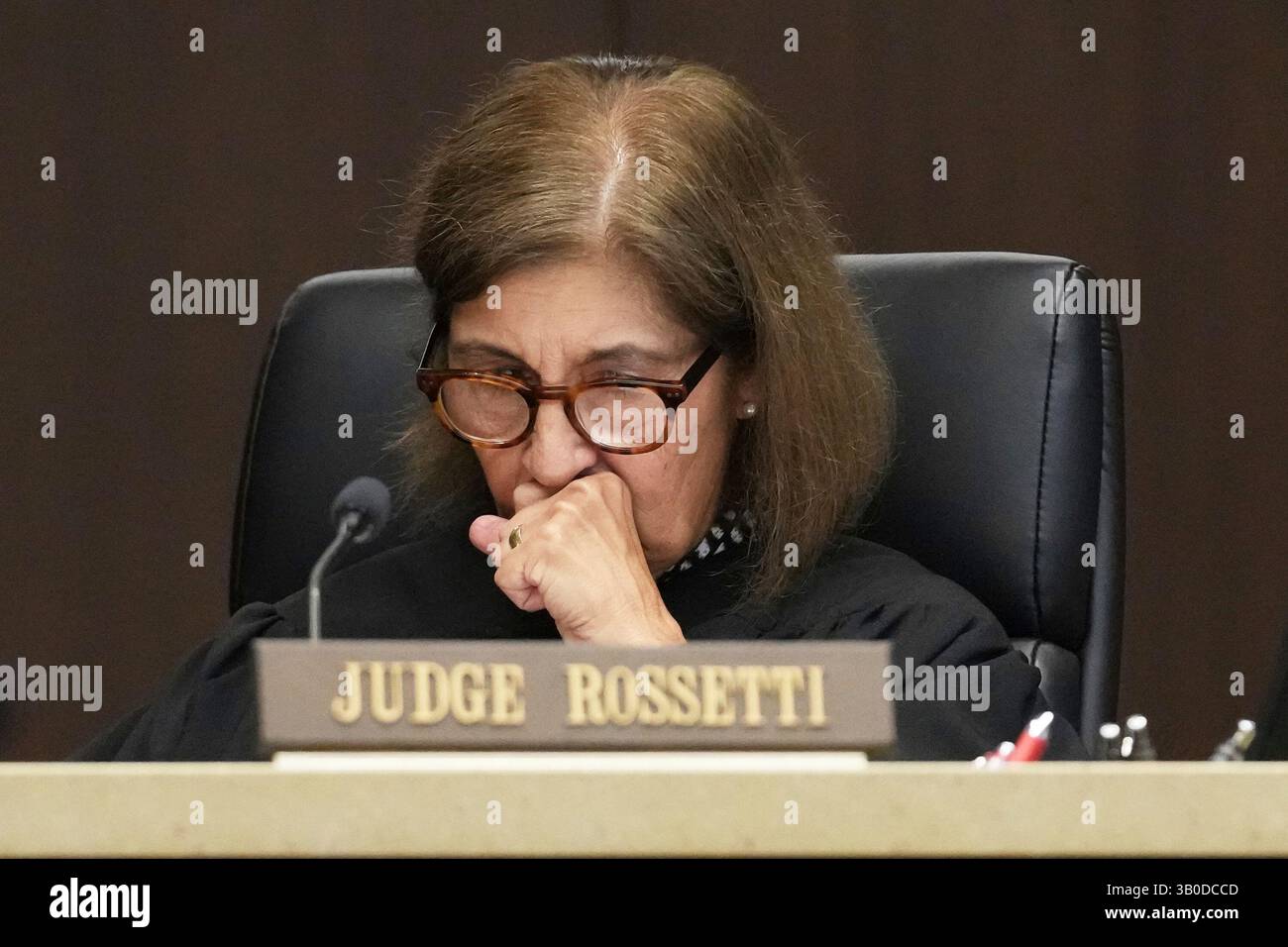 Judge Victoria A. Rossetti listens to Tracy Hartlieb while Tracy ...