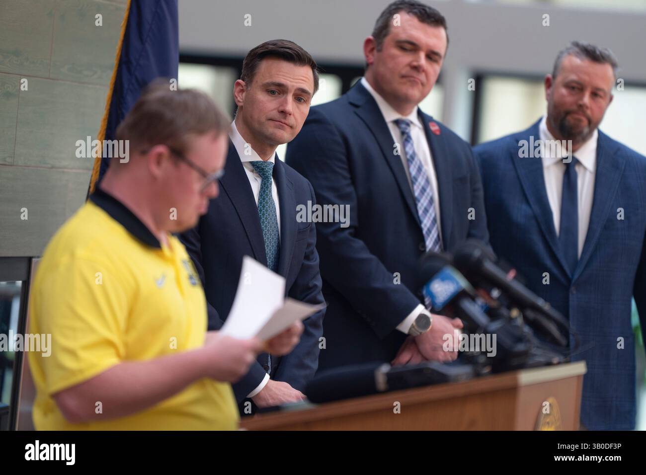 Oregon Attorney General Dan Rayfield, second from left, listens as Cody ...