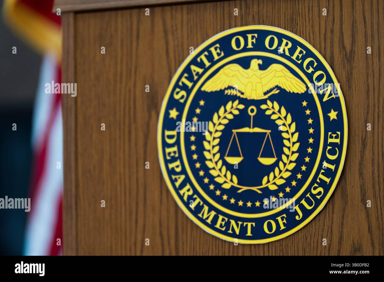 The seal for the Department of Justice is seen before a news conference ...