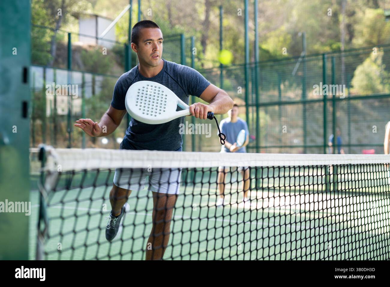 Male tennis player performing backhand hi-res stock photography and ...